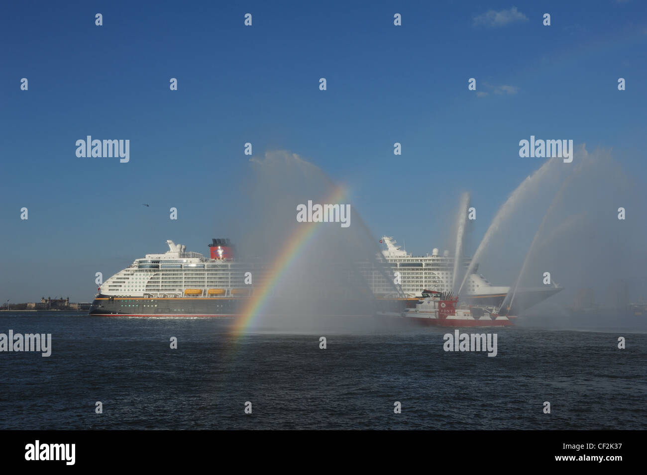 Greeted by fireboat Three Forty Three, Disney Fantasy paid her maiden ...