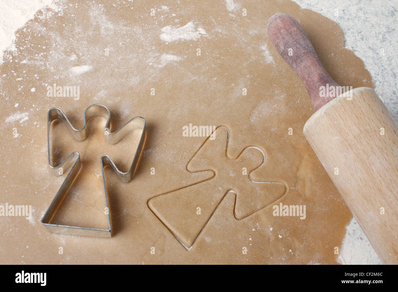 Cookie dough with christmas angles Stock Photo - Alamy
