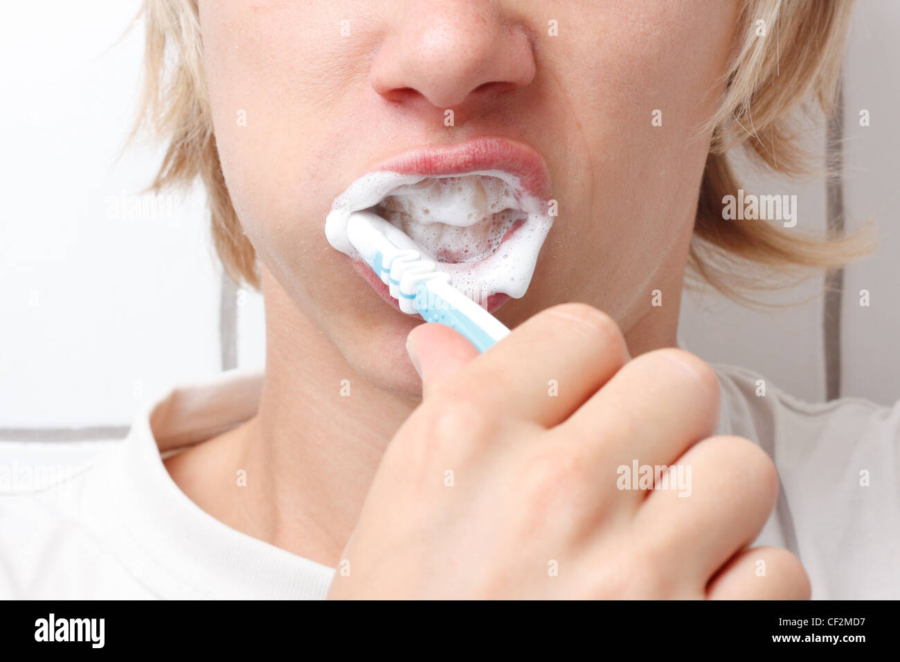 A person brushing his teeth Stock Photo - Alamy