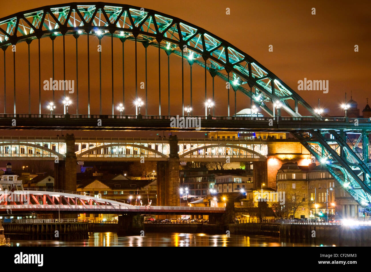 Evening view of the famous Tyne Bridges spanning the River Tyne to link ...