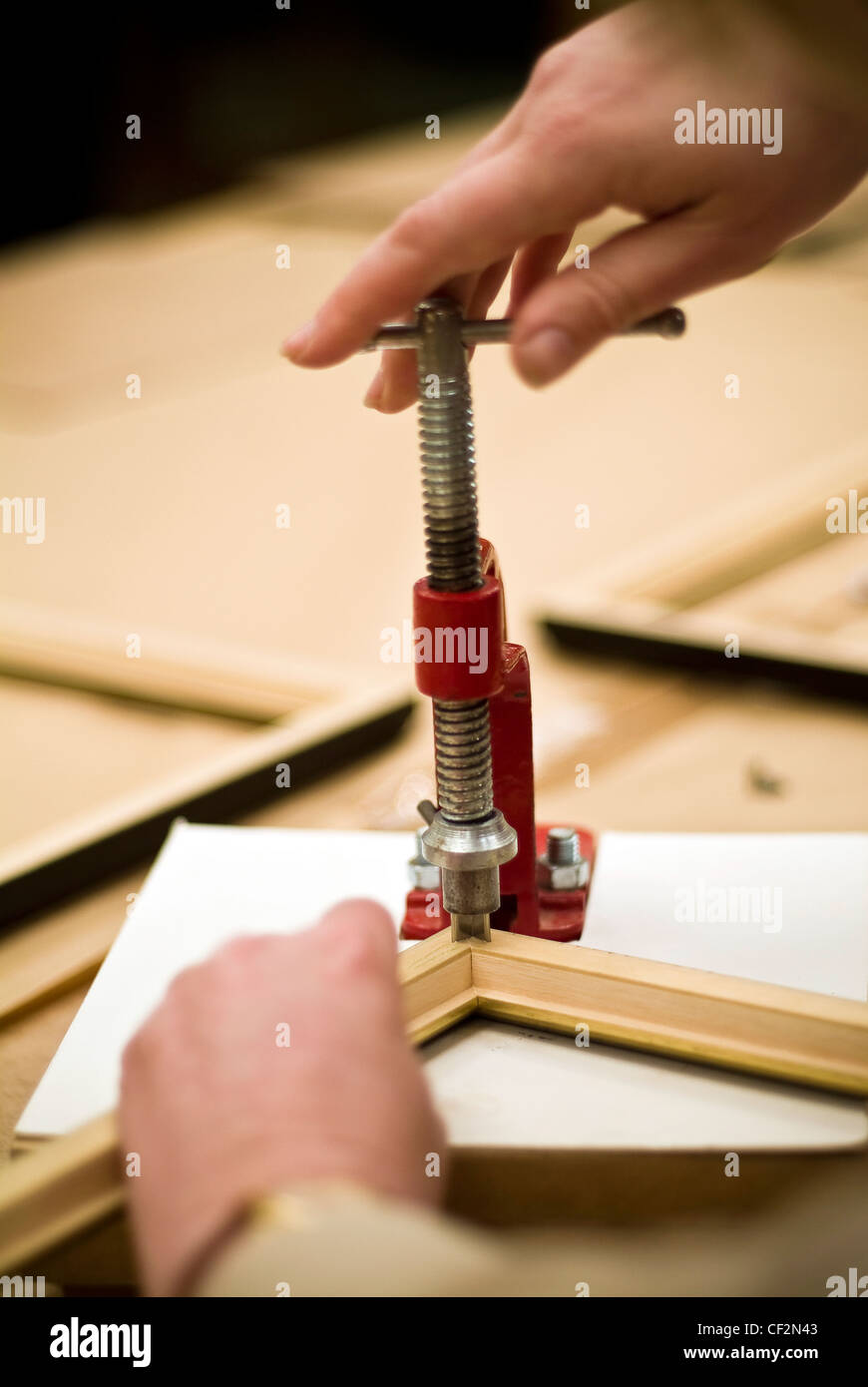 Picture frame being stapled and glued together Stock Photo - Alamy