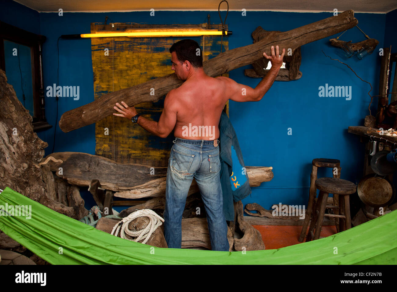 man carrying trunk, woods washed up from the sea,self portrait in my ...