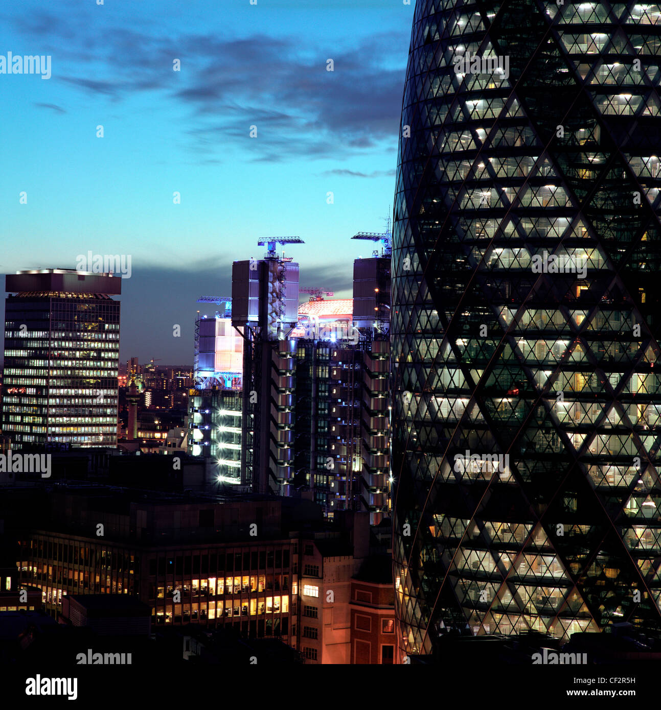 The Gherkin and Lloyds building in London at night Stock Photo - Alamy