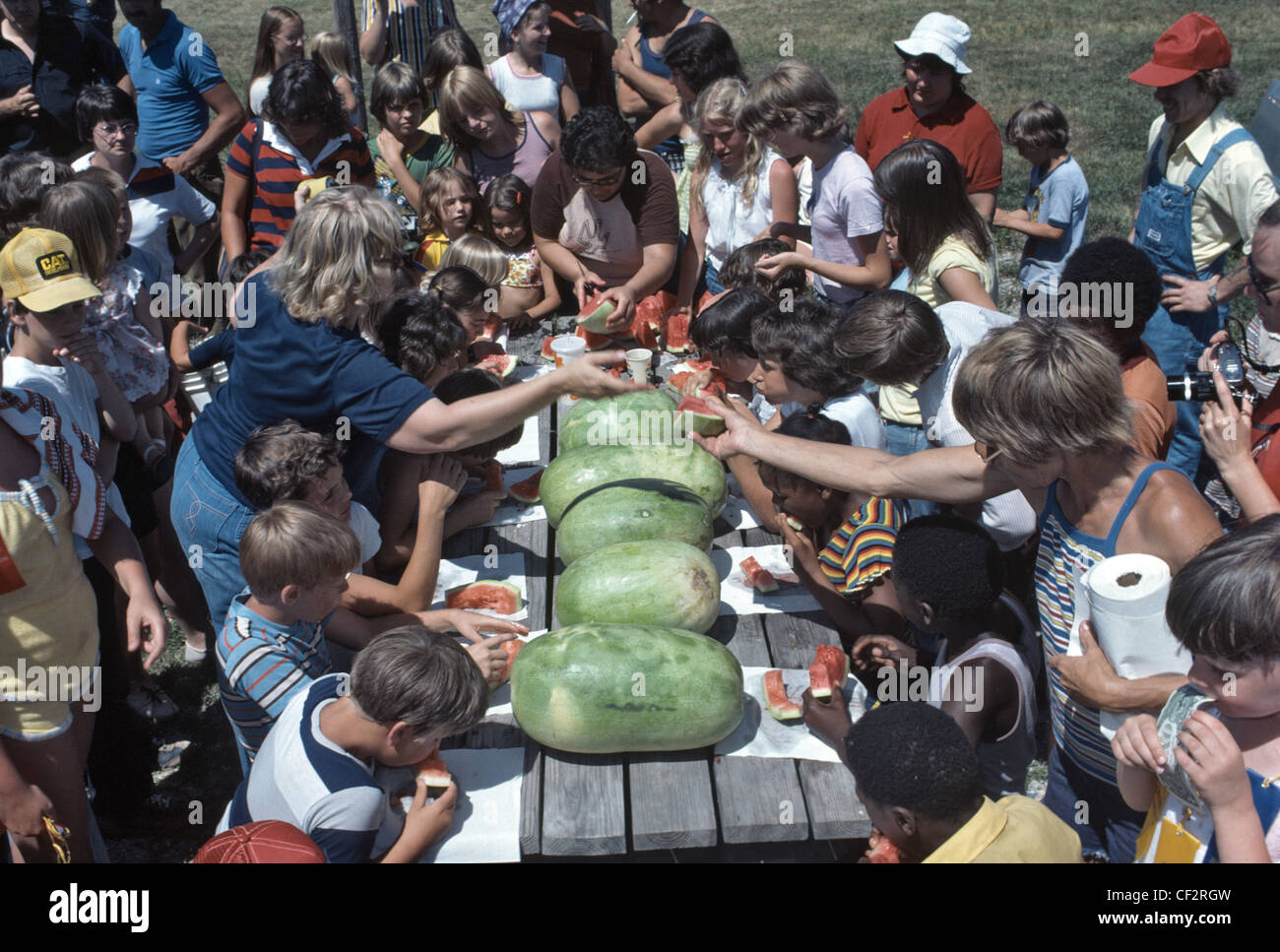 children participating in a watermelon contest Stock Photo - Alamy