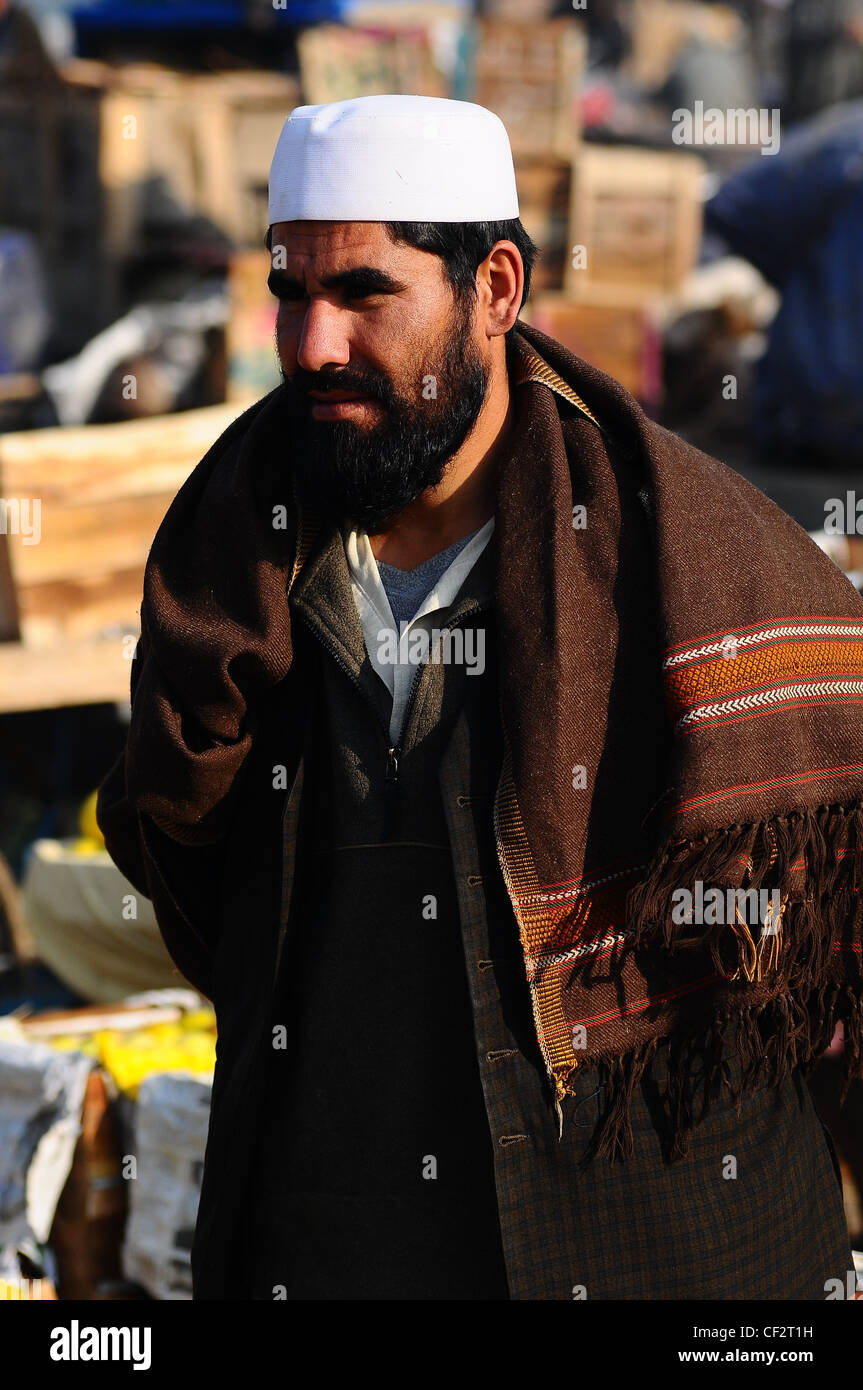 A man with a beard in subzi mandi ( fruit and vegetable wholesale ...