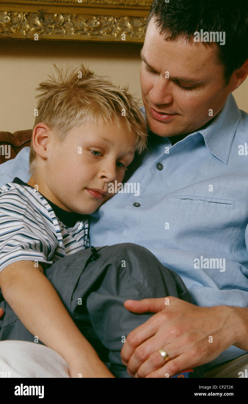 Father short brown hair wearing short sleeved blue shirt male child ...