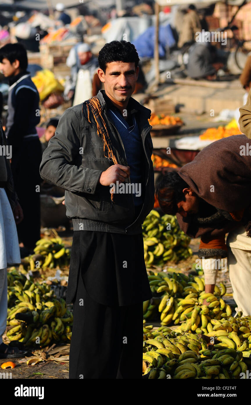 A buyer at the subzi mandi (fruit and vegetable wholesale market) in ...