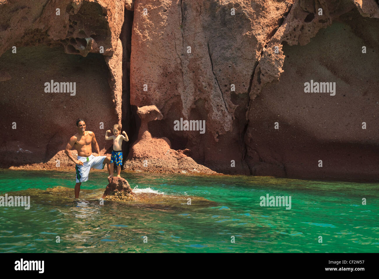 Father son flexing muscles High Resolution Stock Photography and Images ...