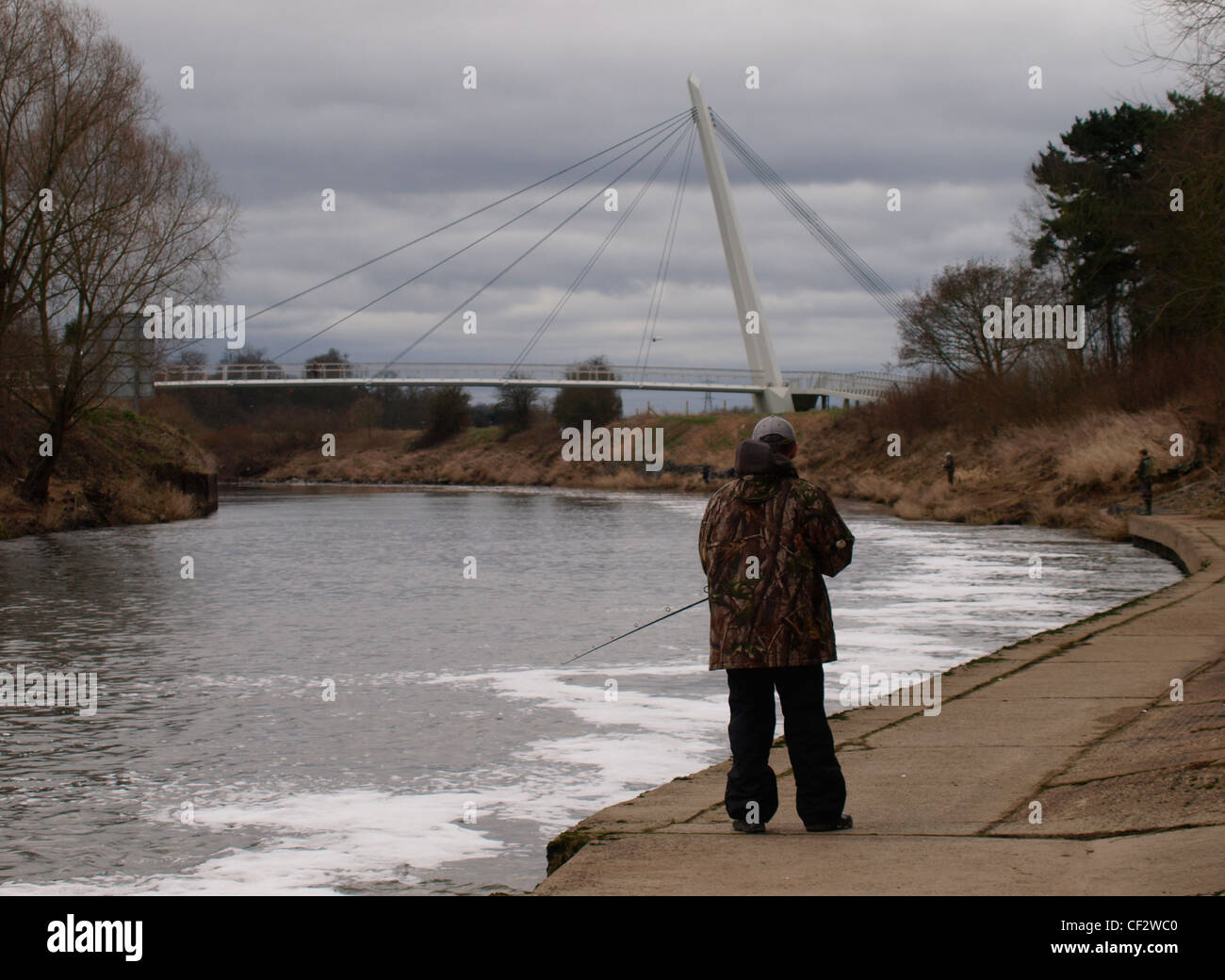 Salmon fishermen on the River Severn, Worcester with the Diglis Bridge ...