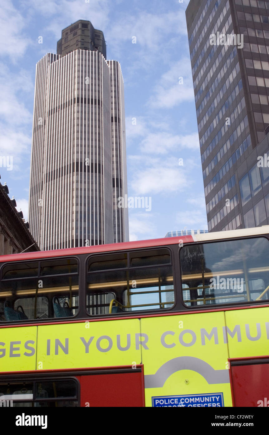 Natwest Tower with bus. Officially known as Tower 42, it is the tallest ...