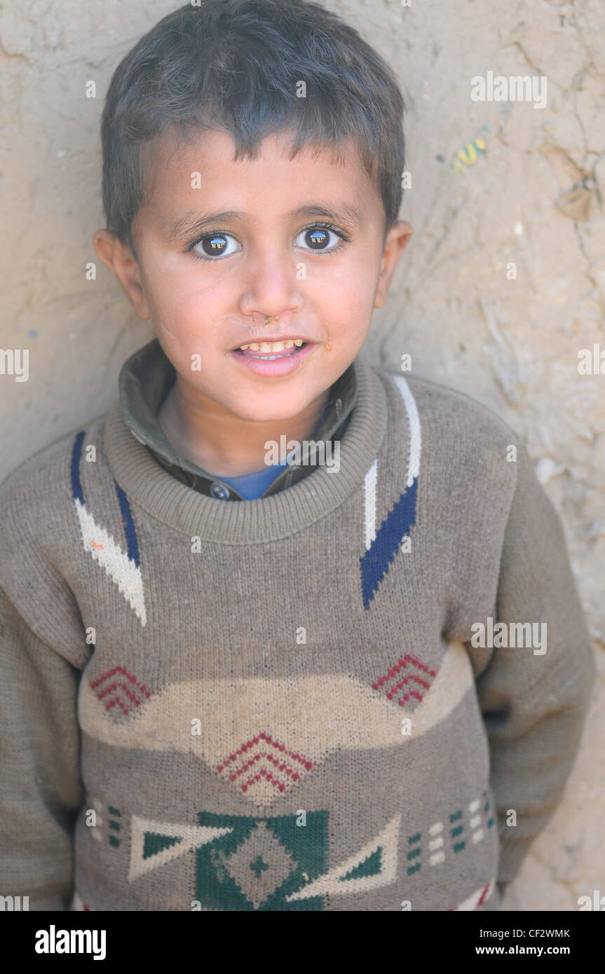 Small boy in a slum in Islamabad, Pakistan Stock Photo - Alamy