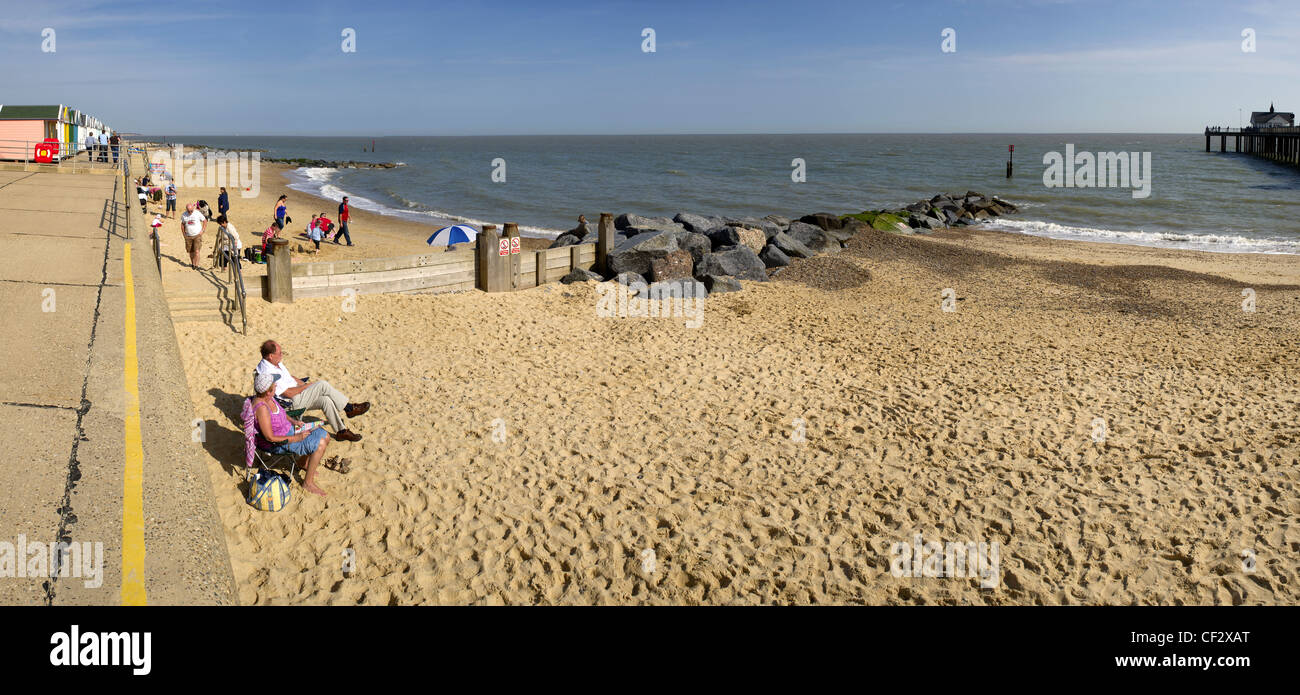 People relaxing in the sunshine on the sandy beach at Southwold Stock ...