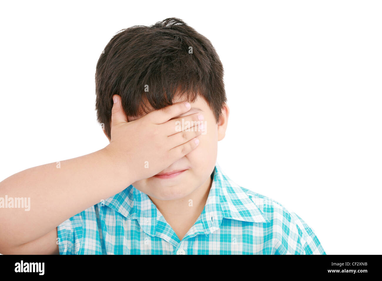portrait of sad crying little boy covers his face with her hand Stock ...