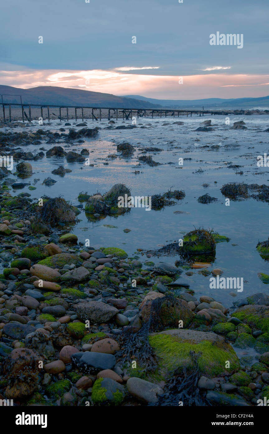 Jetty and beach at Dougarie on the Isle of Arran Stock Photo - Alamy