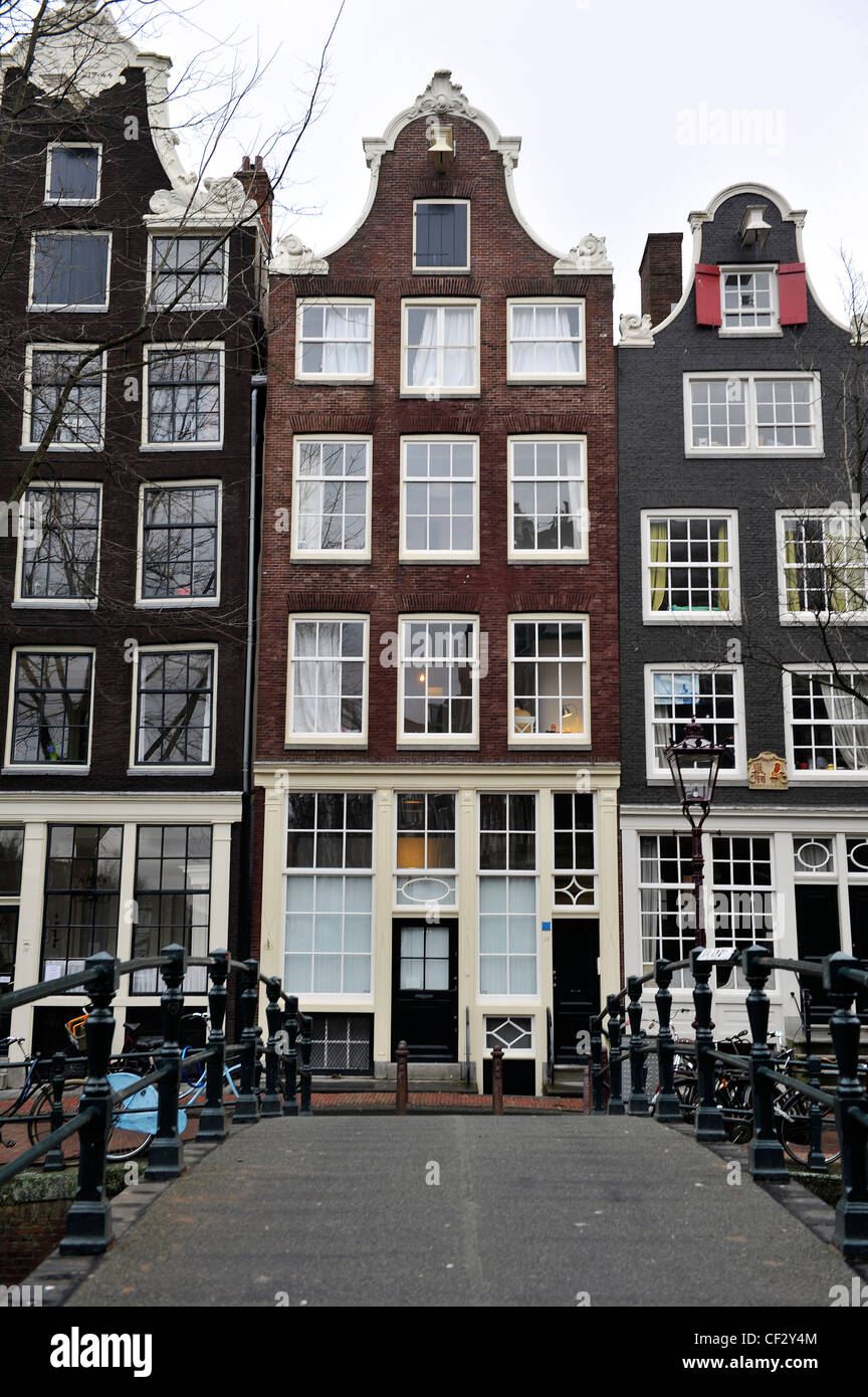 Typical Amsterdam buildings on the banks of a canal Stock Photo - Alamy