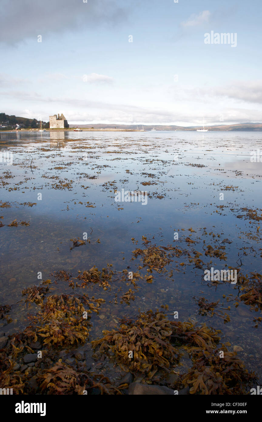 The ruin of Lochranza Castle in the middle of Lochranza on the Isle of ...