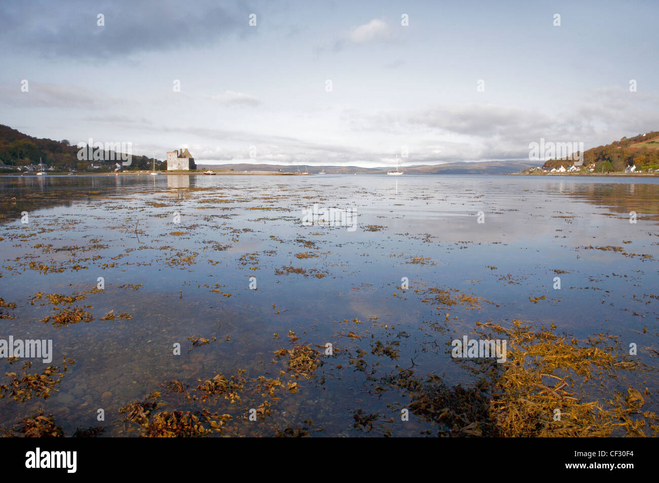 The ruin of Lochranza Castle in the middle of Lochranza on the Isle of ...