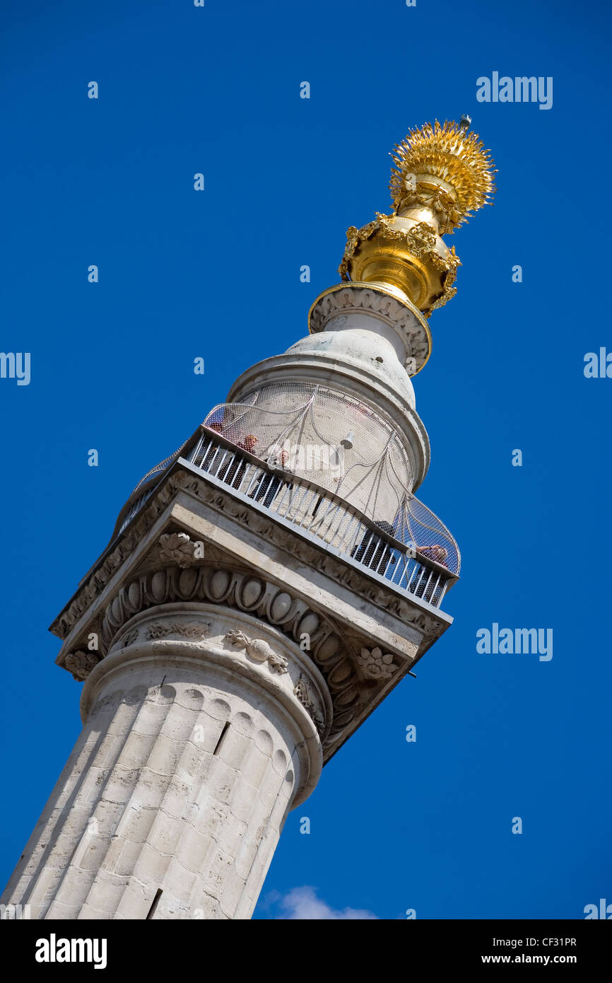 Looking up the Monument to the viewing platform and flame at the top ...