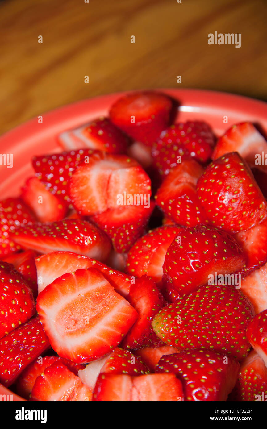 Strawberries cut in pieces Stock Photo - Alamy