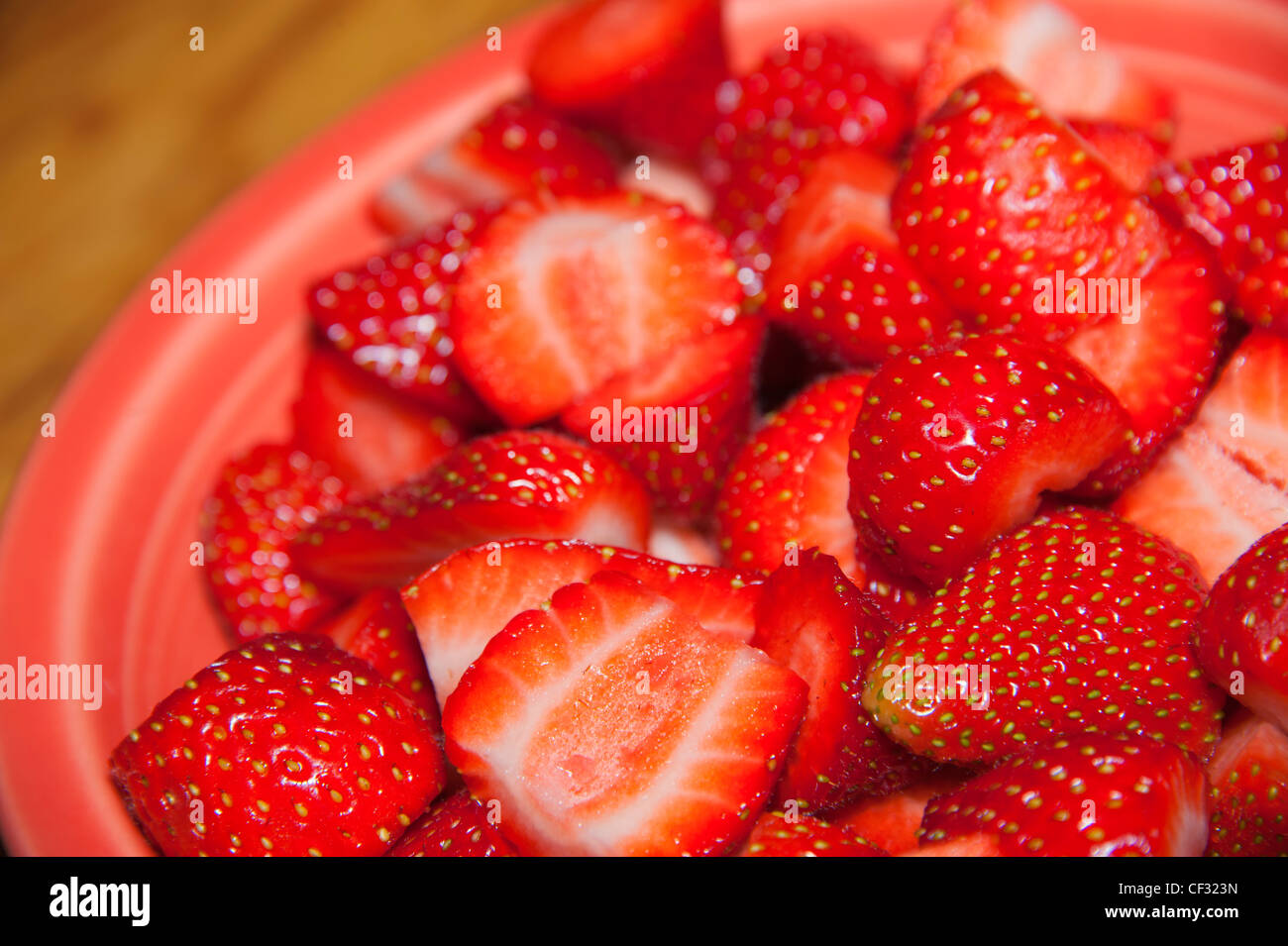 Strawberry halves hi-res stock photography and images - Alamy
