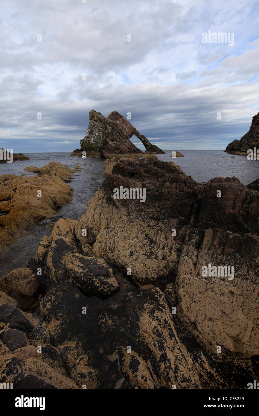 Bow Fiddle Rock, a large rock just off the coast that resembles the bow ...