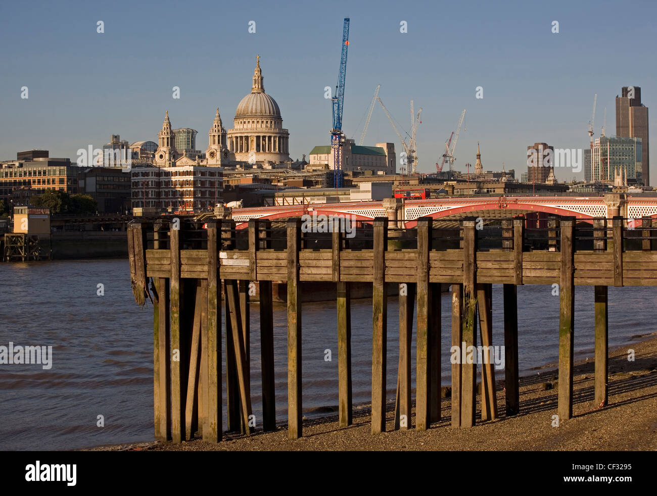 A jetty on the South Bank of the River Thames with Blackfriars road ...