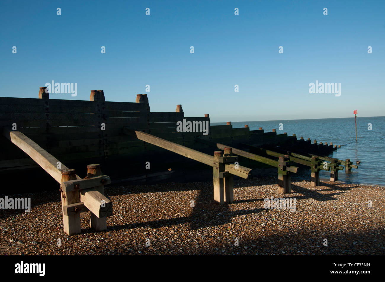 Breakwater on beach kent, coastal sea defenses Stock Photo - Alamy