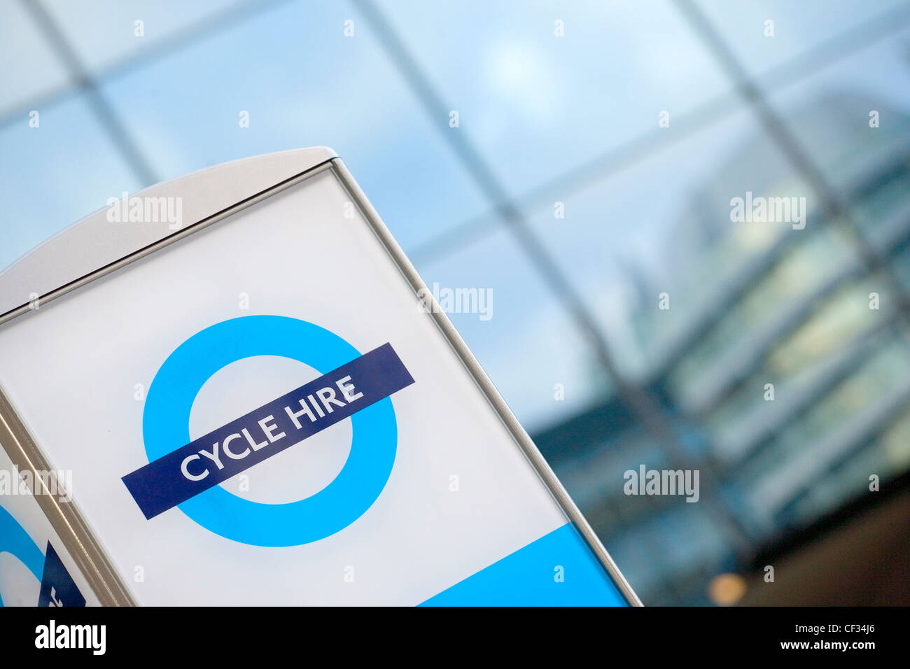 A Barclays Cycle Hire sign above a docking station Stock Photo - Alamy