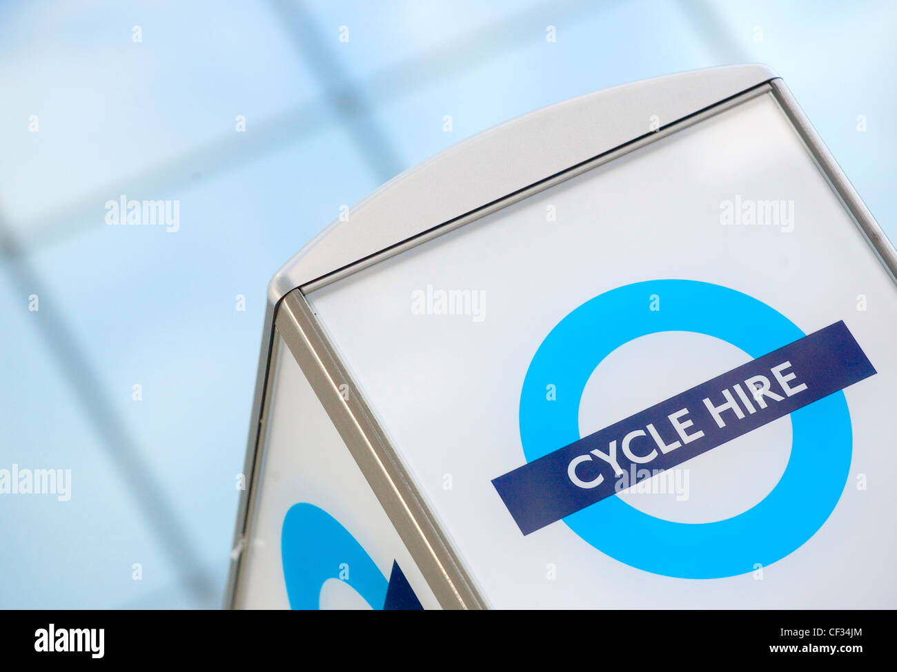 A Barclays Cycle Hire sign above a docking station Stock Photo - Alamy
