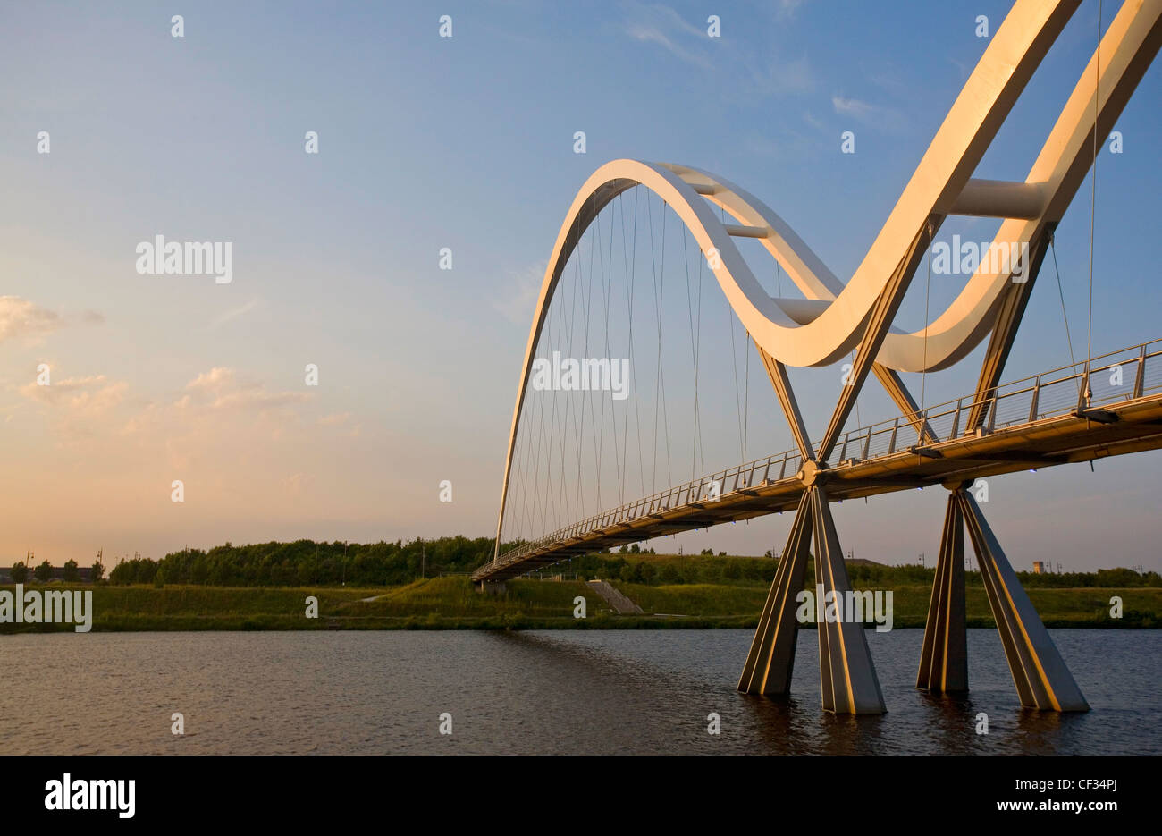 The Infinity Bridge, a pedestrian and cycle bridge across the River ...