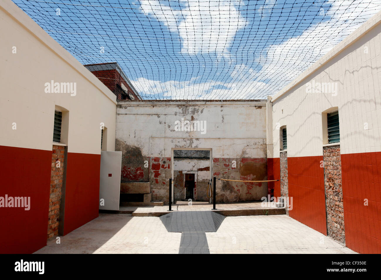 Number four prison building secured by barbed wire within the city of ...