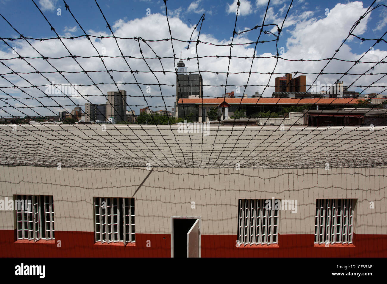 Number four prison building secured by barbed wire within the city of ...