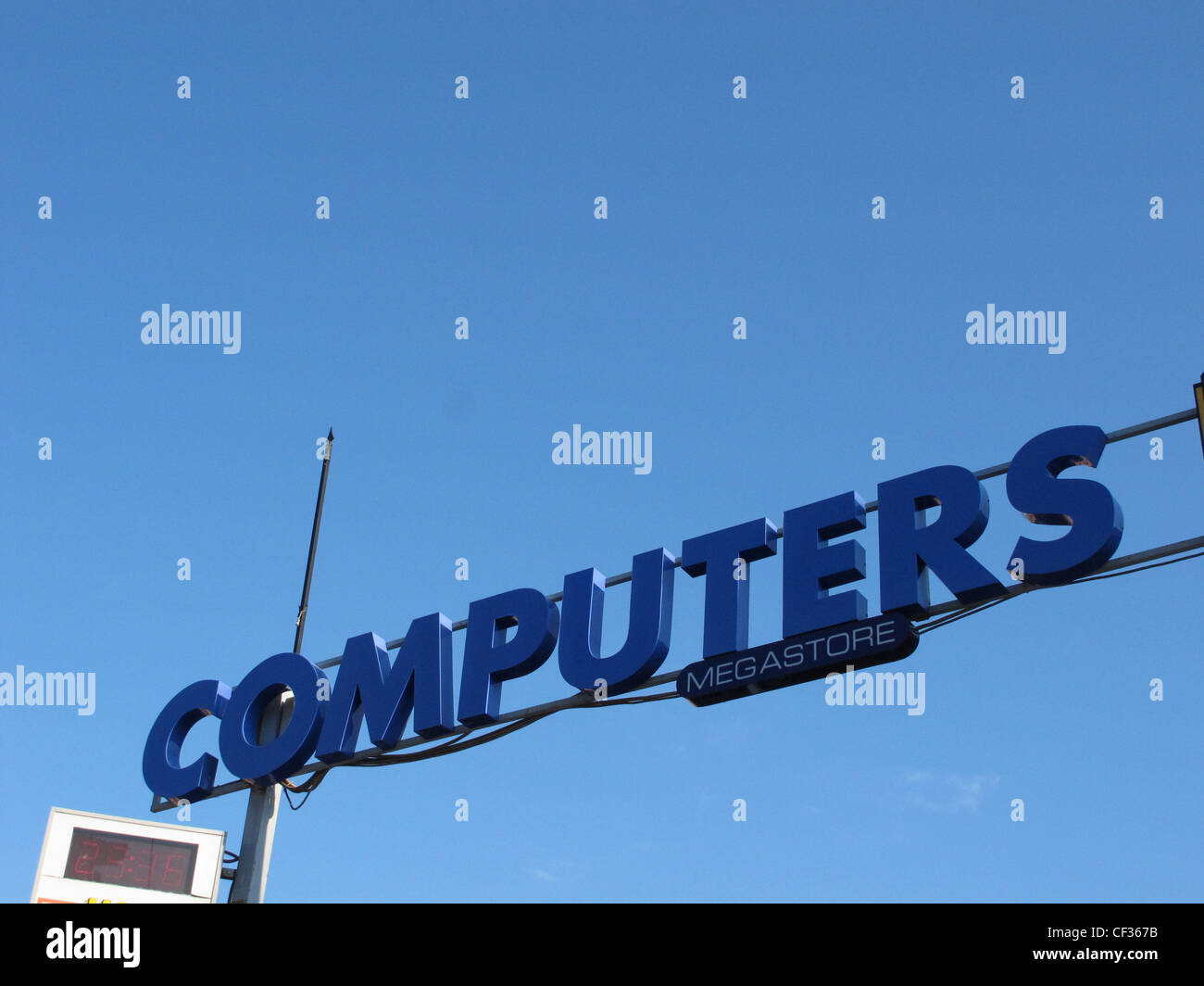 computer shop sign notice and blue sky Stock Photo - Alamy