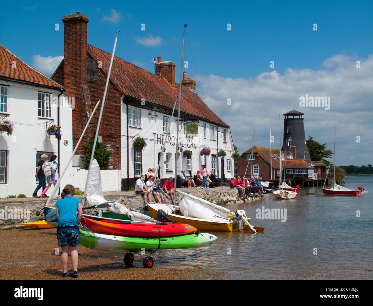 The Royal Oak Pub and Mill in Langstone, Hampshire Stock Photo - Alamy
