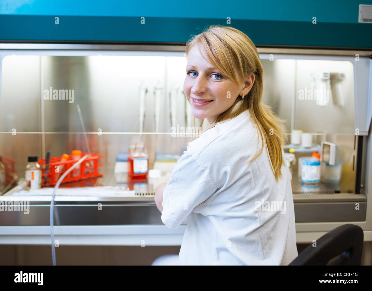 Female researcher doing research in a lab Stock Photo - Alamy