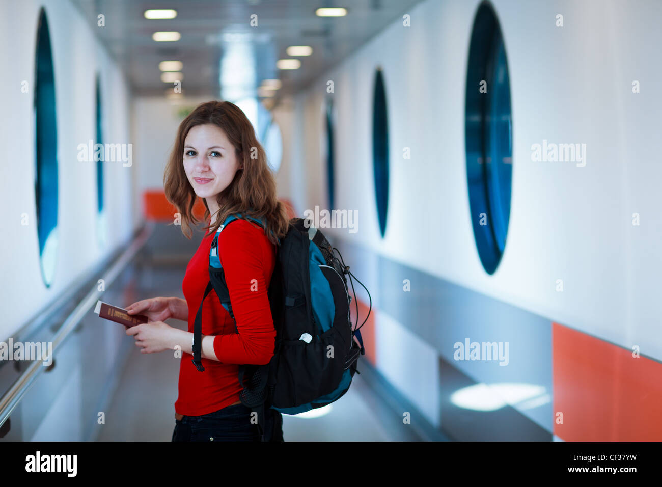 Portrait of a young woman boarding an aircraft Stock Photo - Alamy