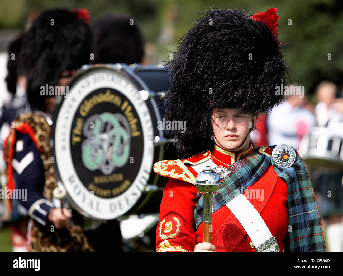 The March Leader and marching band at the Lonach Highland Games Stock ...