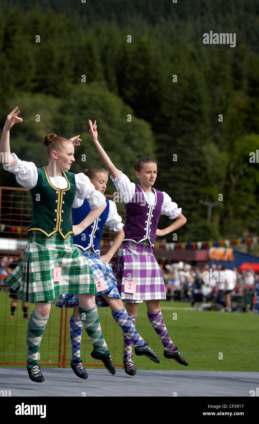 Young female highland dancers performing at the Lonach Highland Games ...