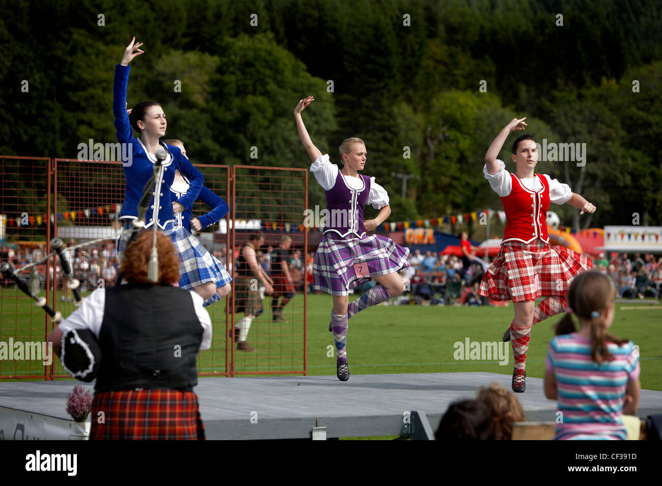 Young female highland dancers performing at the Lonach Highland Games ...