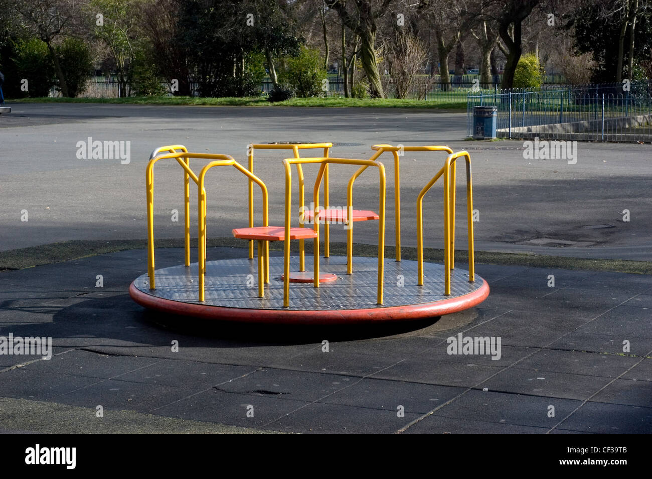 Roundabout in a childrens playground Stock Photo - Alamy