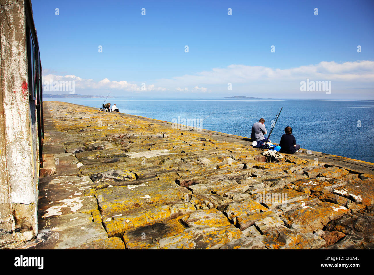 Fishermen on Granton Harbour in Edinburgh Stock Photo - Alamy