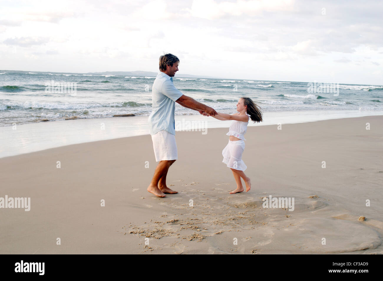 Father spinning daughter around hi-res stock photography and images - Alamy