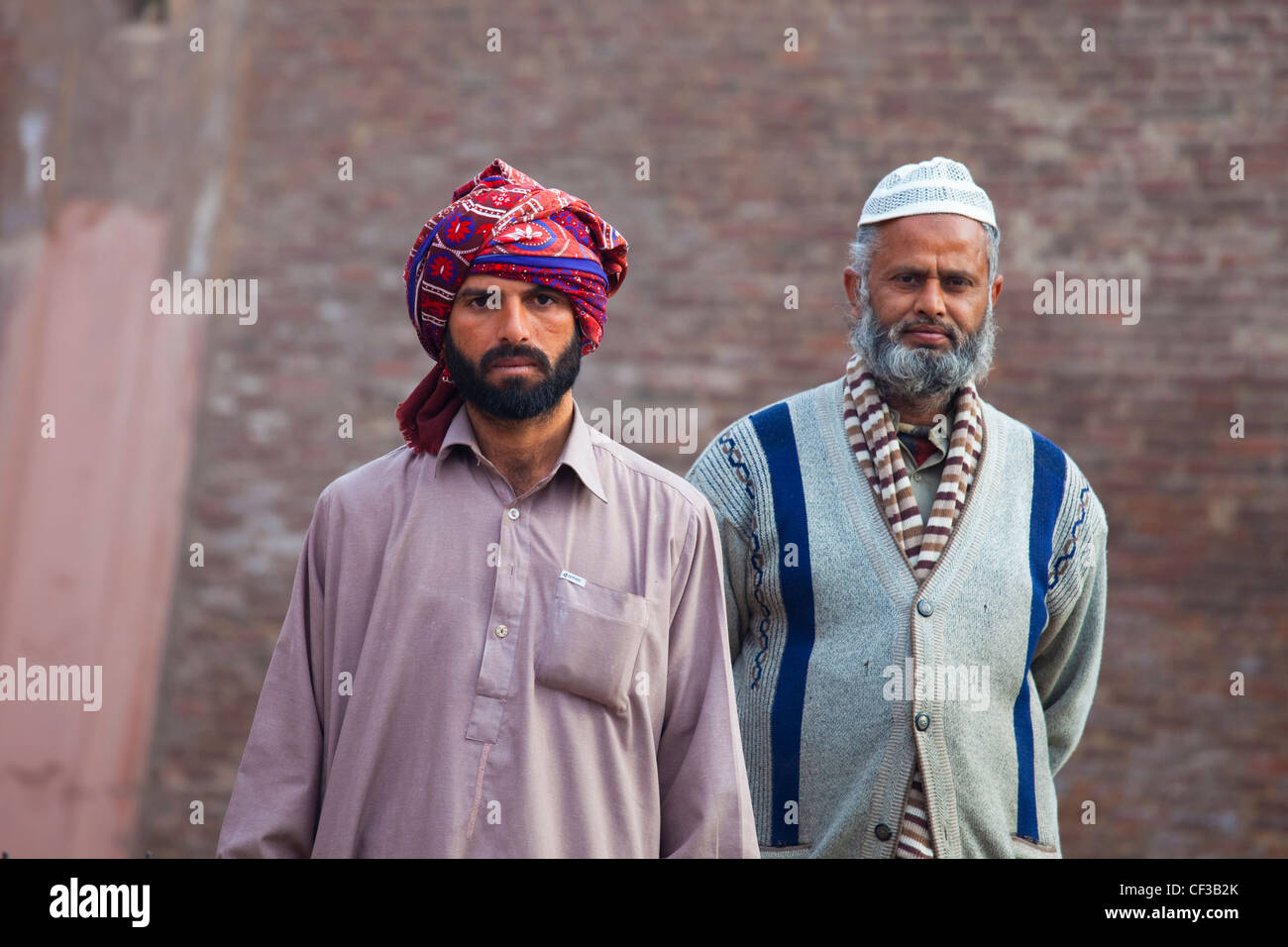 Workmen inside the Lahore Fort, Lahore, Pakistan Stock Photo - Alamy
