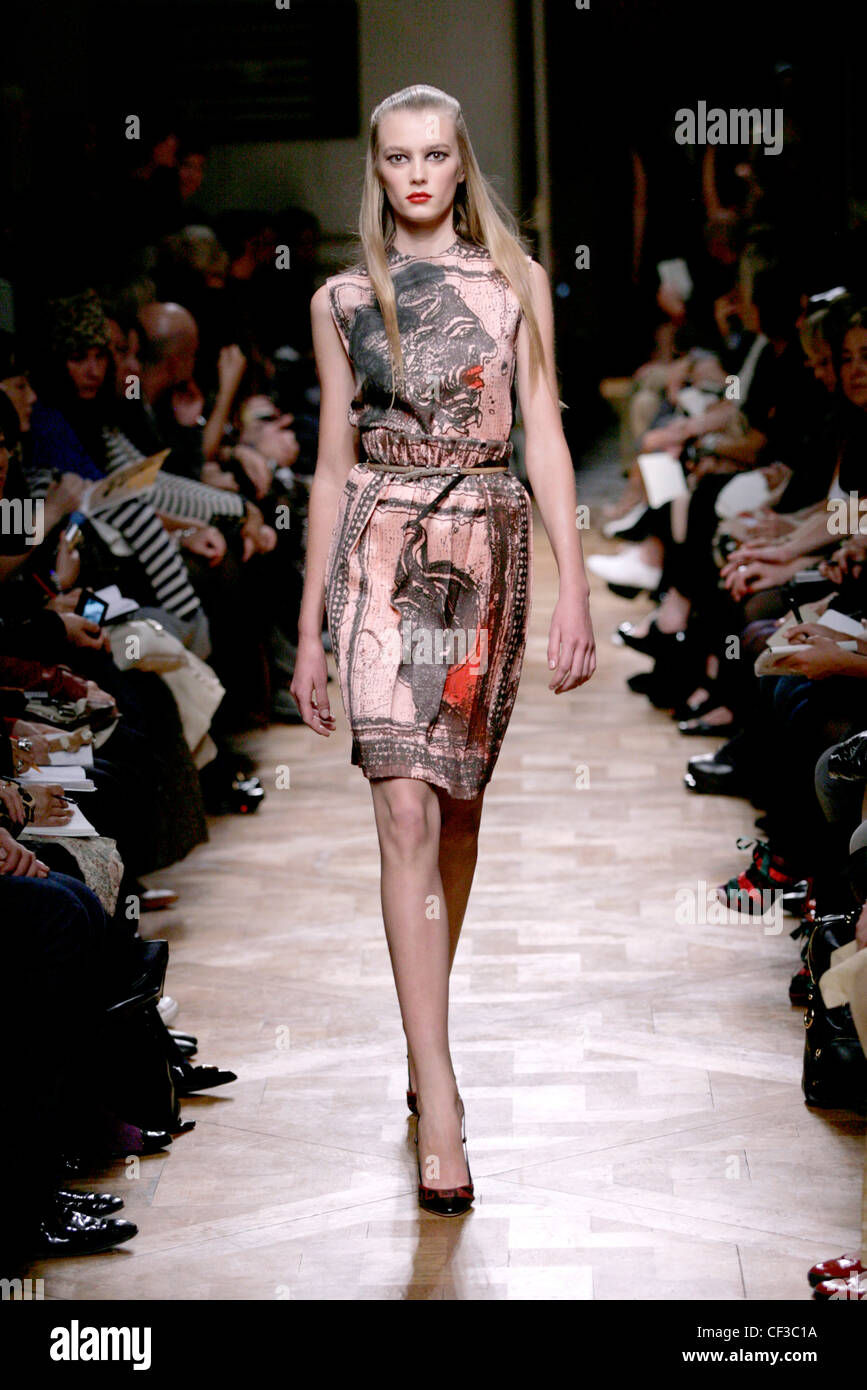 Miu Miu Paris Ready to Wear Spring Summer Model wearing a sleeveless ...
