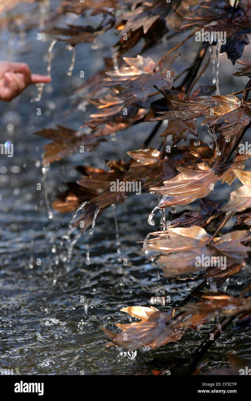 Water feature with metal maple leaves at Hampton Court Palace flower ...