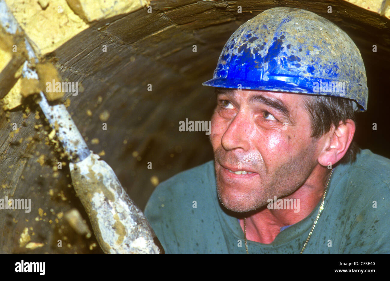 Drainage worker, London, UK Stock Photo - Alamy