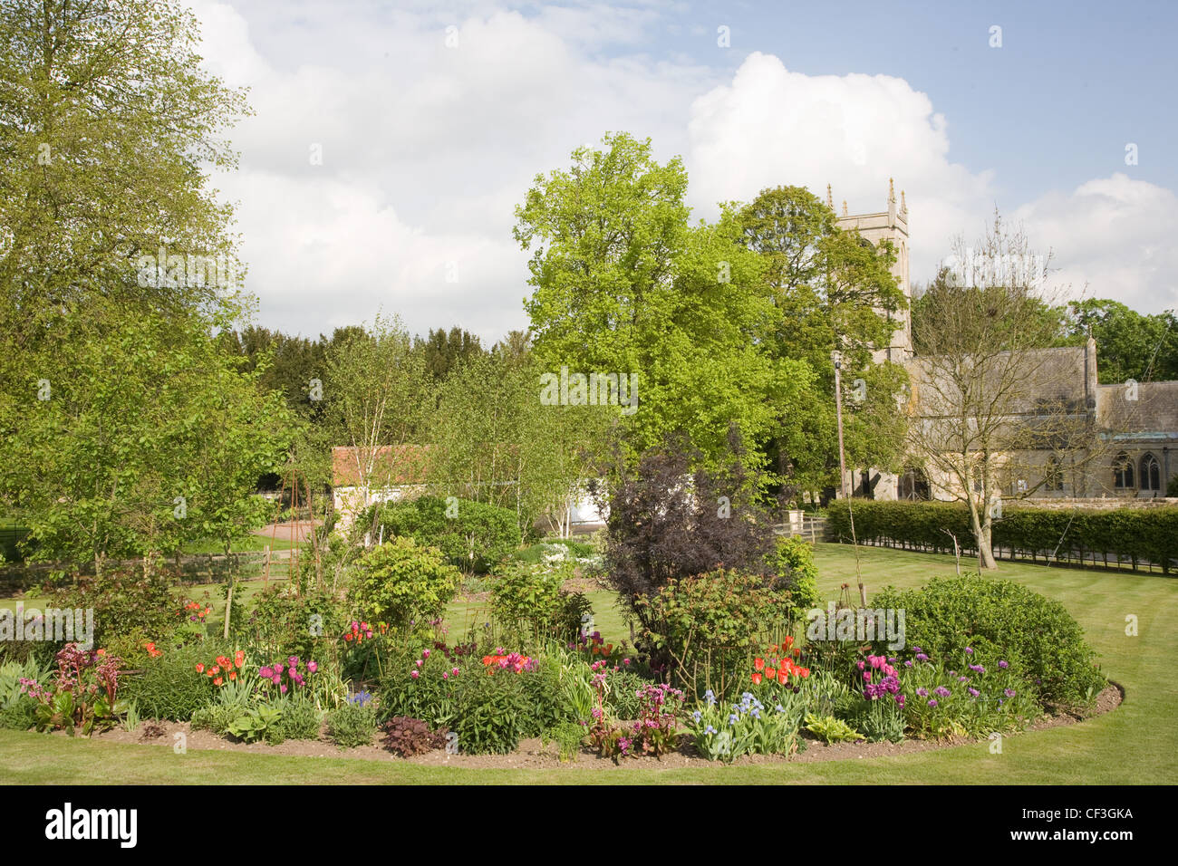 The Moat Garden Looking past a circular bed in front of the house ...