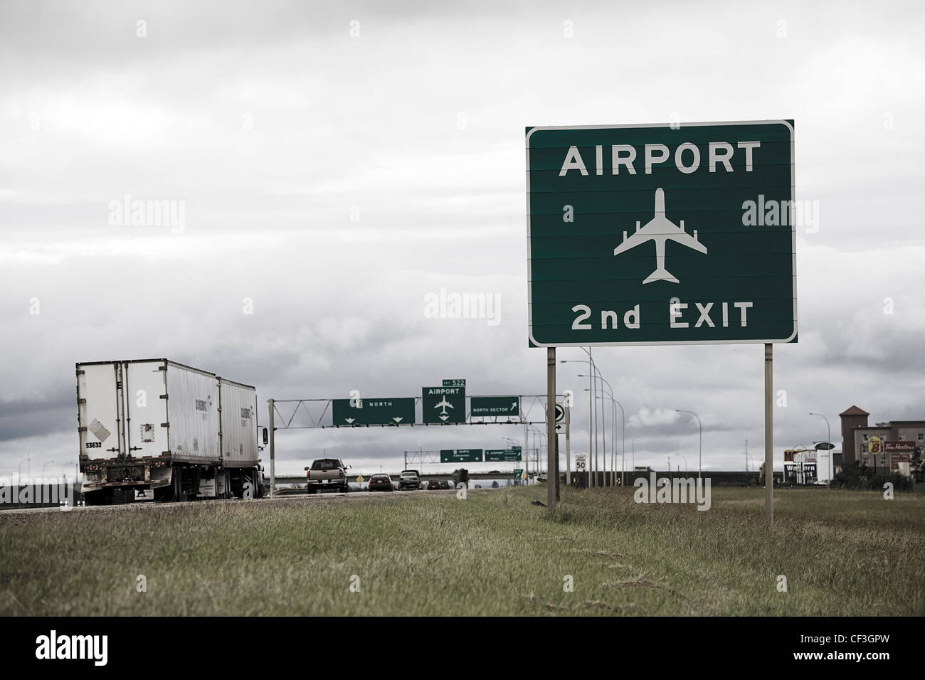 Airport highway sign Stock Photo - Alamy