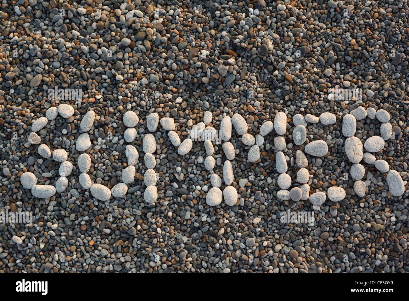 Beach, word summer combined from white stones on dark pebble Stock ...