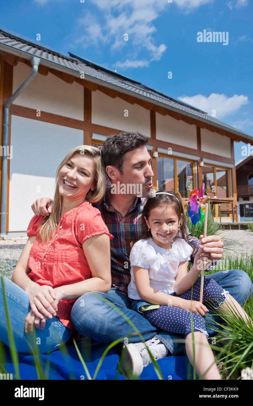 Family in front of Lehner energy house, Poing, Bavaria, Germany, Europe ...